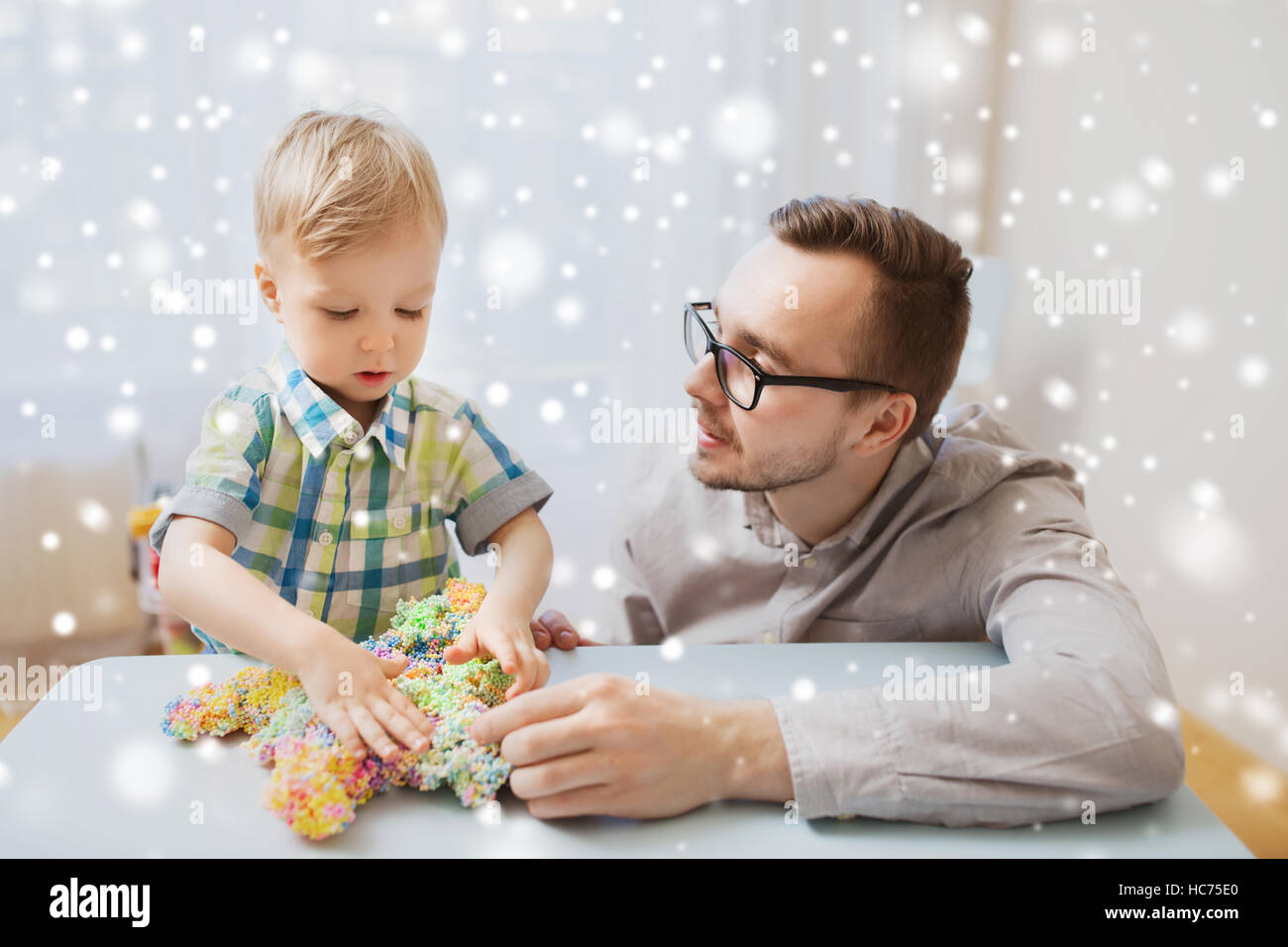 father and son playing with ball clay at home Stock Photo - Alamy