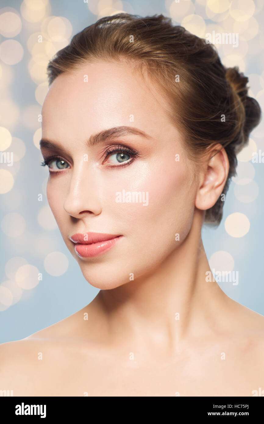 beautiful young woman face over white background Stock Photo - Alamy