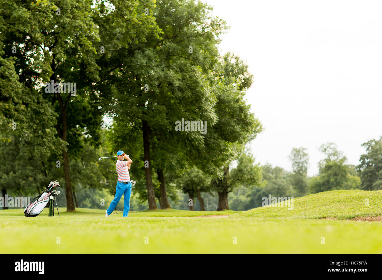 Playing golf player golfer course hi-res stock photography and images ...