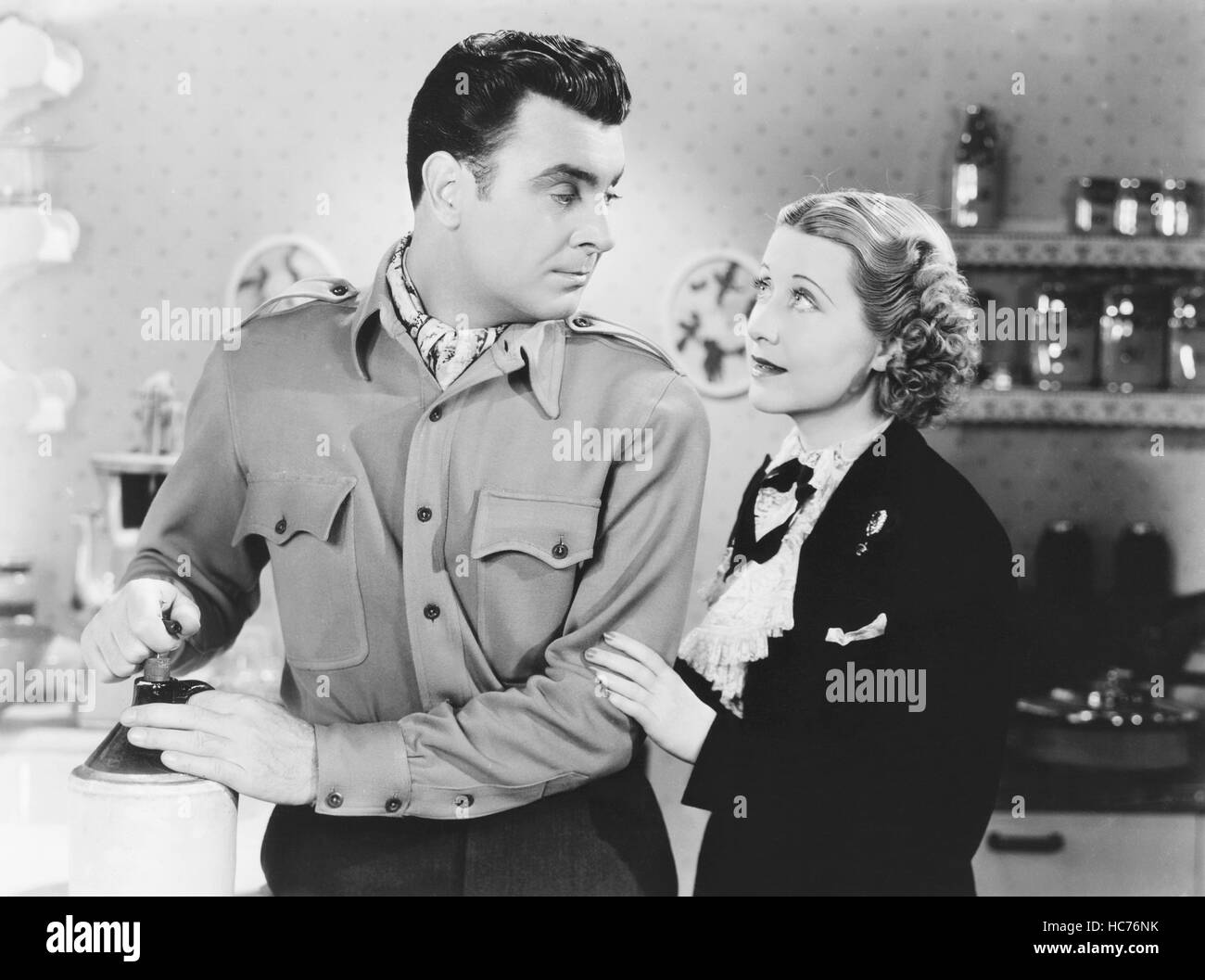 SNOWED UNDER, from left: George Brent, Genevieve Tobin, 1936 Stock ...