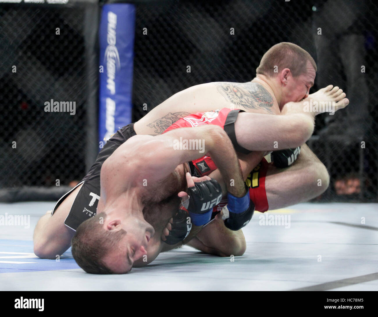 UFC fighter Paul Kelly, right, fights Jacob Volkmann at UFC-Live: Jones ...