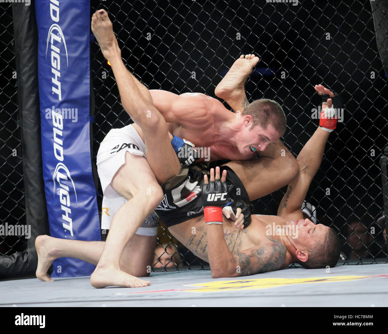 UFC fighter Matthew Riddle, top, fights, DaMarques Johnson at UFC-Live ...