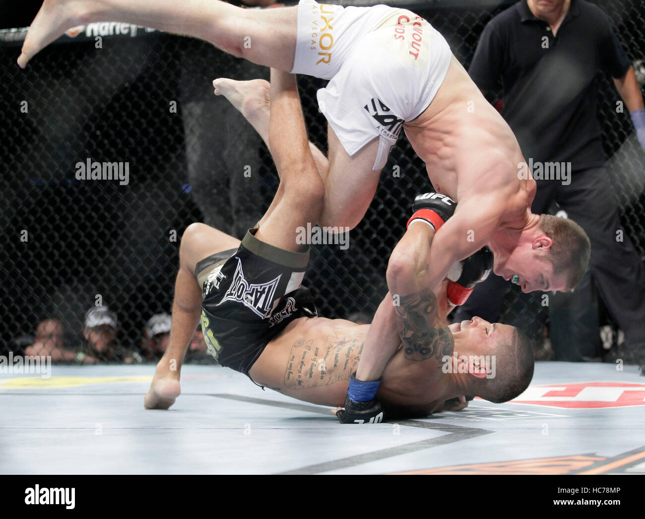 UFC fighter Matthew Riddle, top, fights, DaMarques Johnson at UFC-Live ...