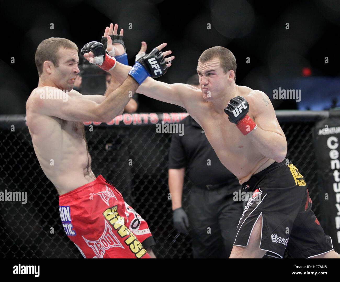 UFC fighter Paul Kelly, right, fights Jacob Volkmann at UFC-Live: Jones ...