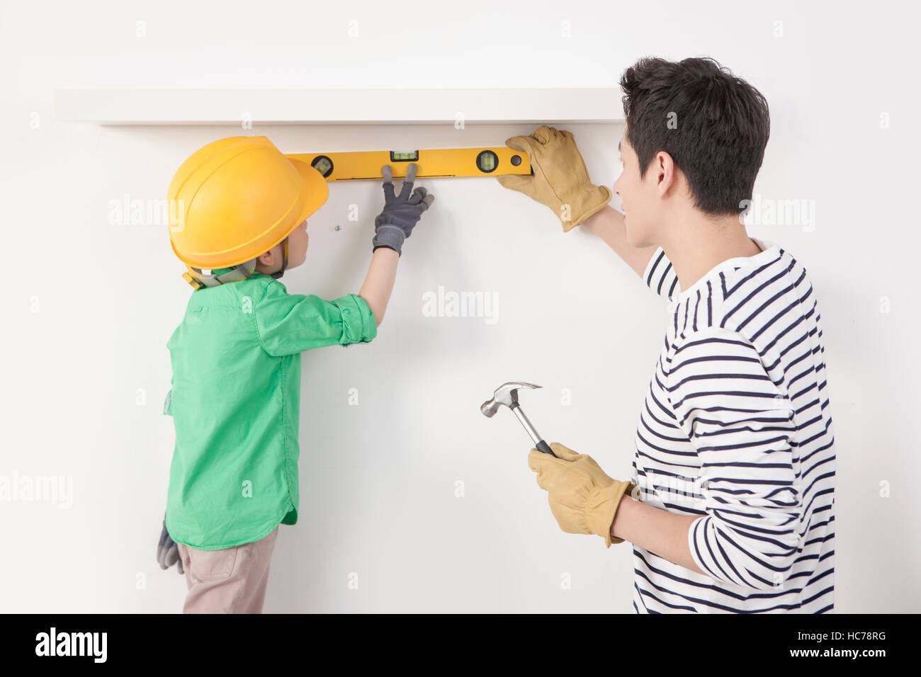 Father and son working with tools Stock Photo - Alamy