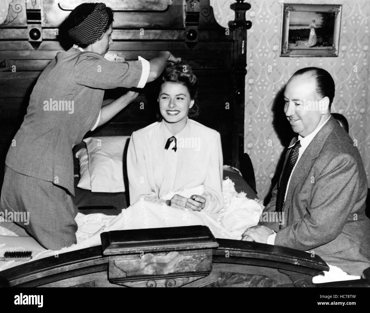 Hairdresser Marie Brasselle combs Ingrid Bergman's hair while director ...