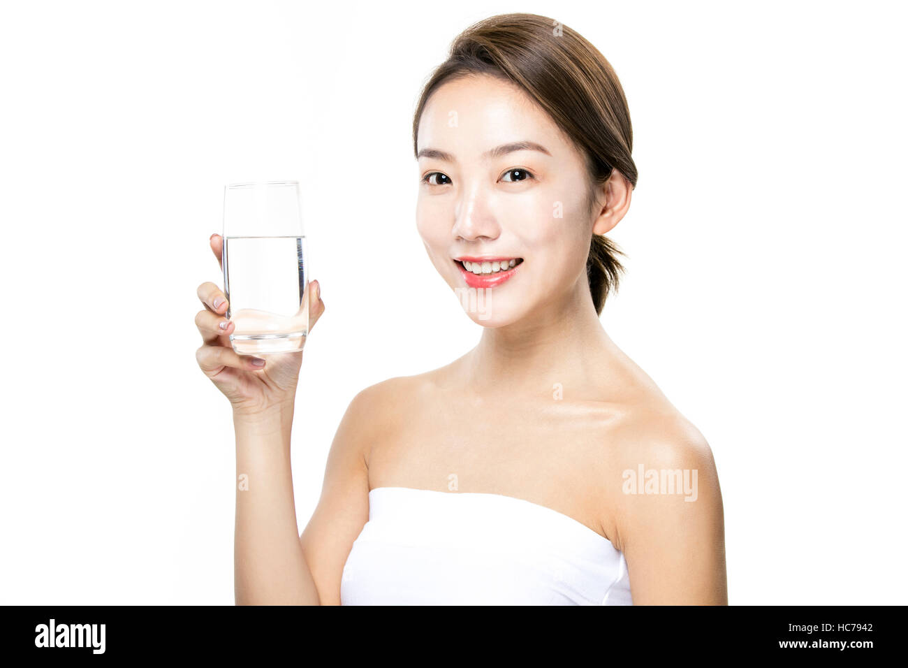 Portrait of young smiling woman with water Stock Photo - Alamy