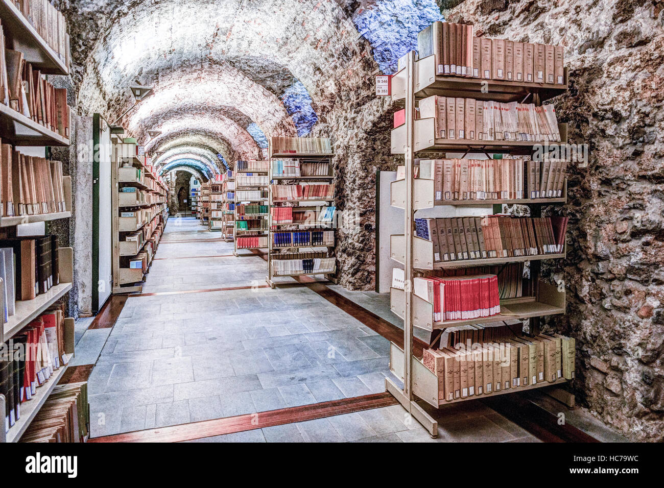 library setting with books and reading material Stock Photo - Alamy