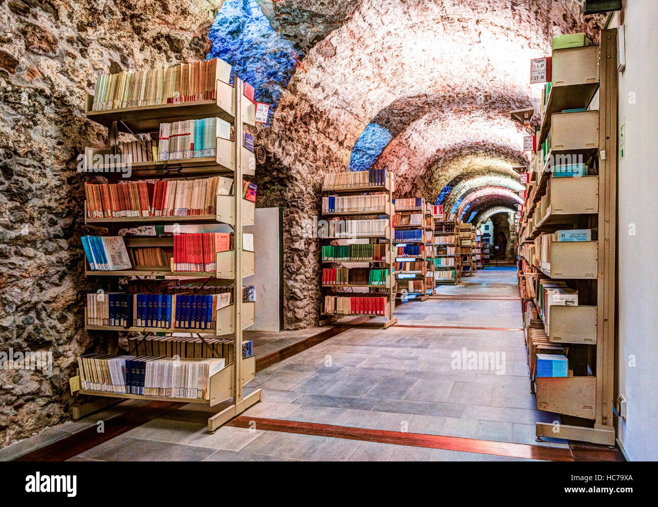 library setting with books and reading material Stock Photo - Alamy