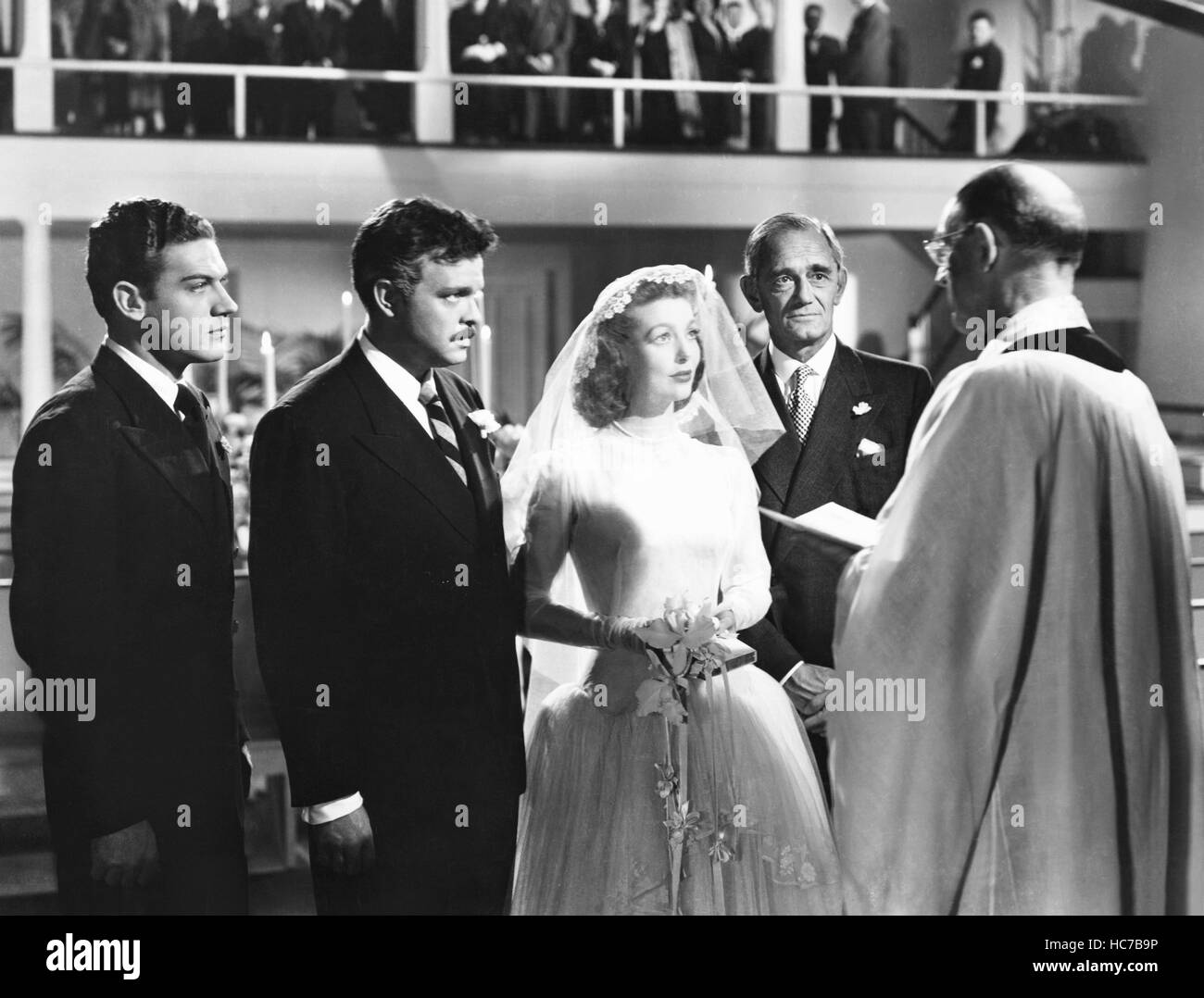 THE STRANGER, from left: Byron Keith, Orson Welles, Loretta Young ...