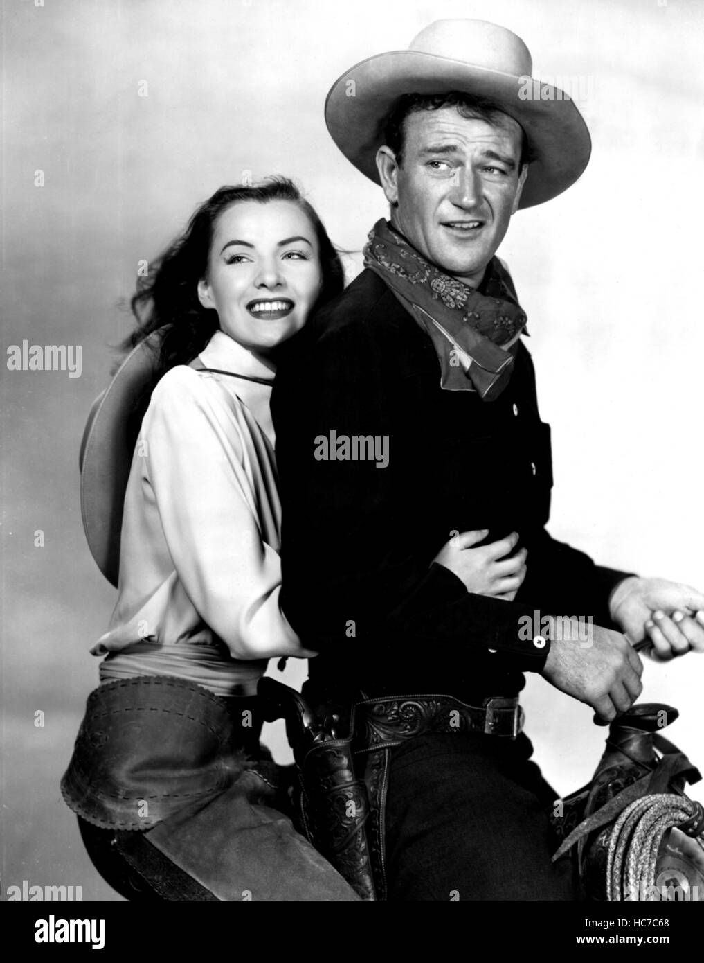 TALL IN THE SADDLE, Ella Raines, John Wayne, 1944 Stock Photo - Alamy