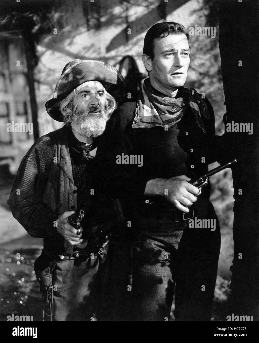 TALL IN THE SADDLE, from left, George 'Gabby' Hayes, John Wayne, 1944 ...