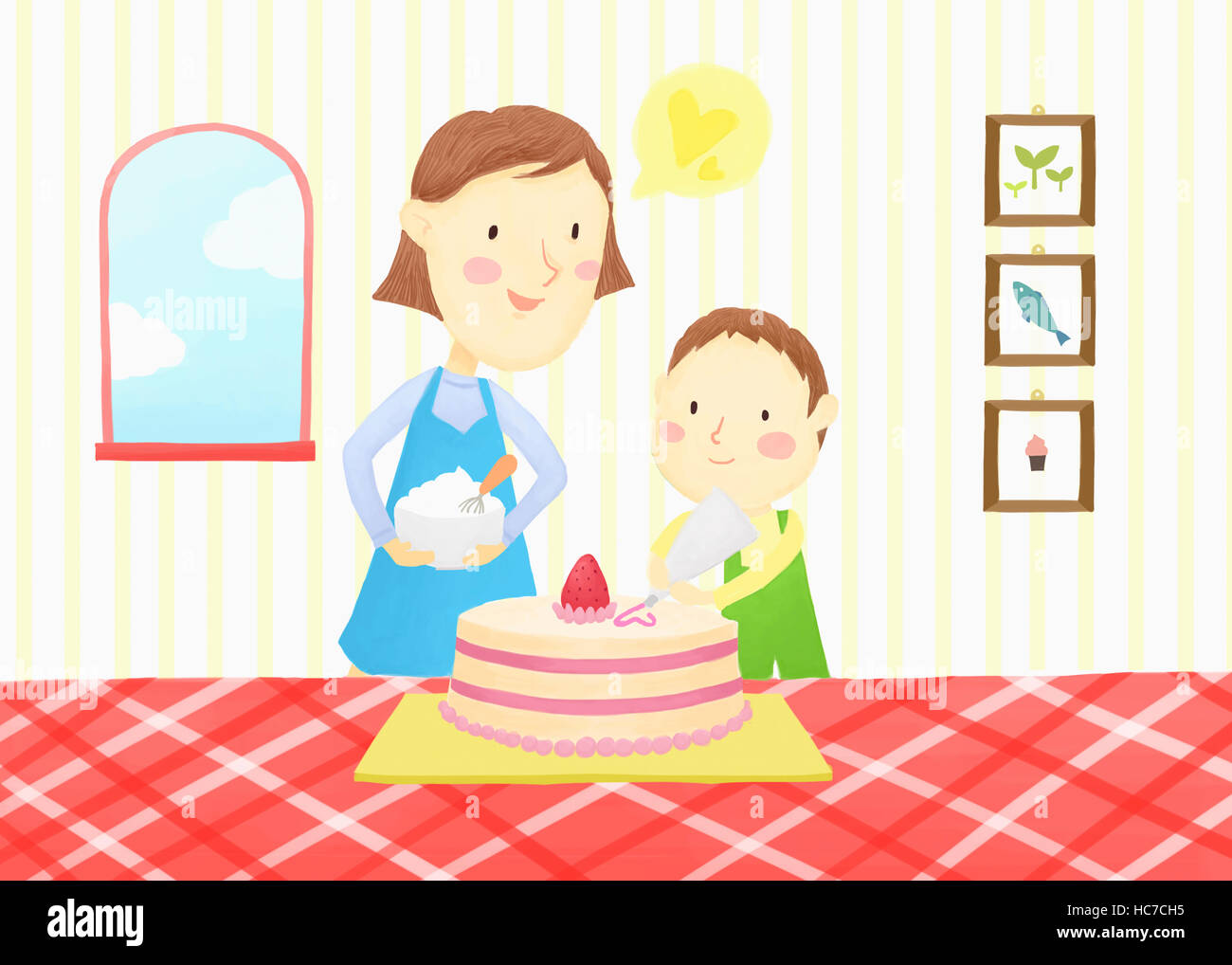 Loving mother and son making a cake together Stock Photo - Alamy