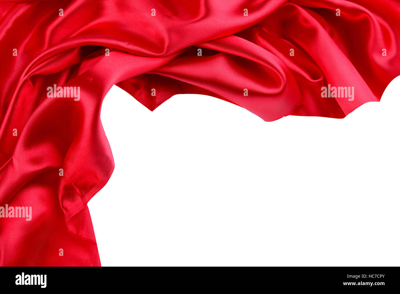 Closeup of folds in red silk fabric on plain background Stock Photo - Alamy