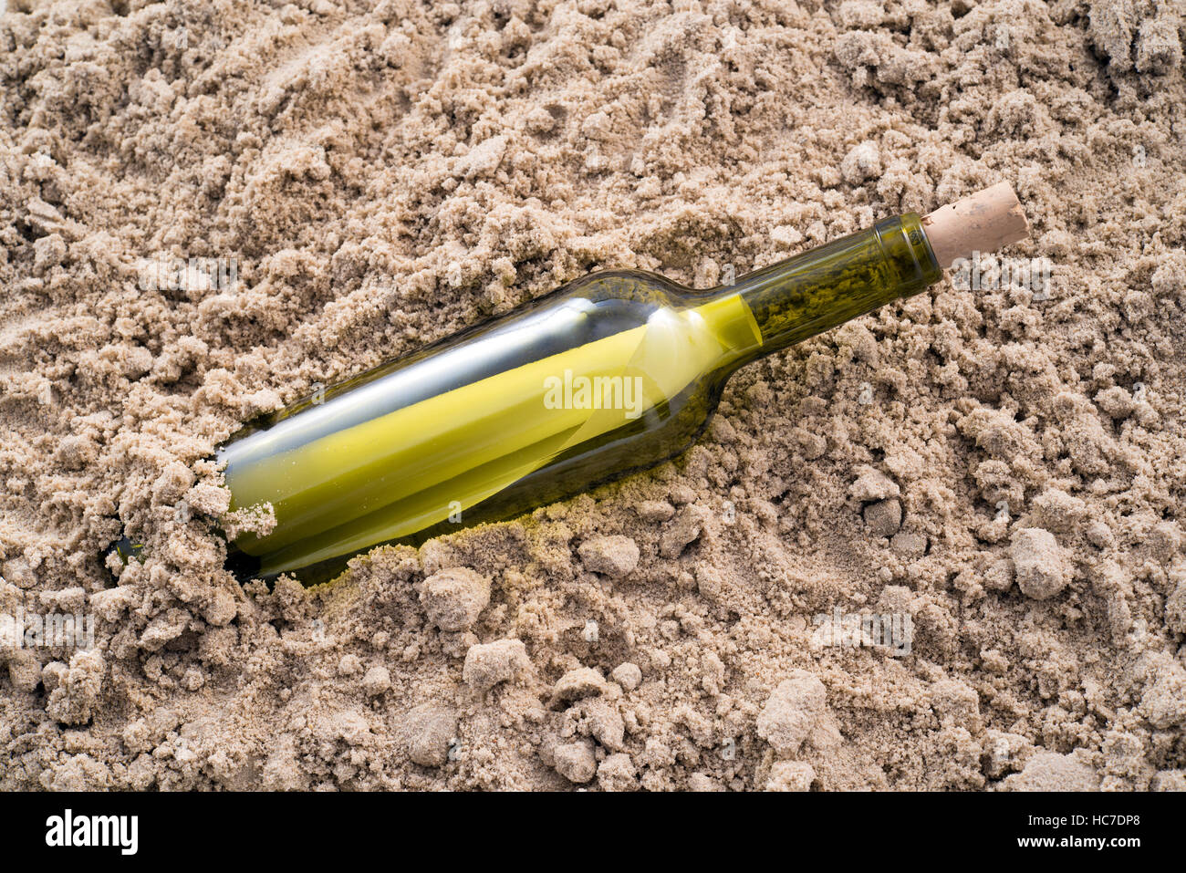 Message in a bottle on beach Stock Photo - Alamy