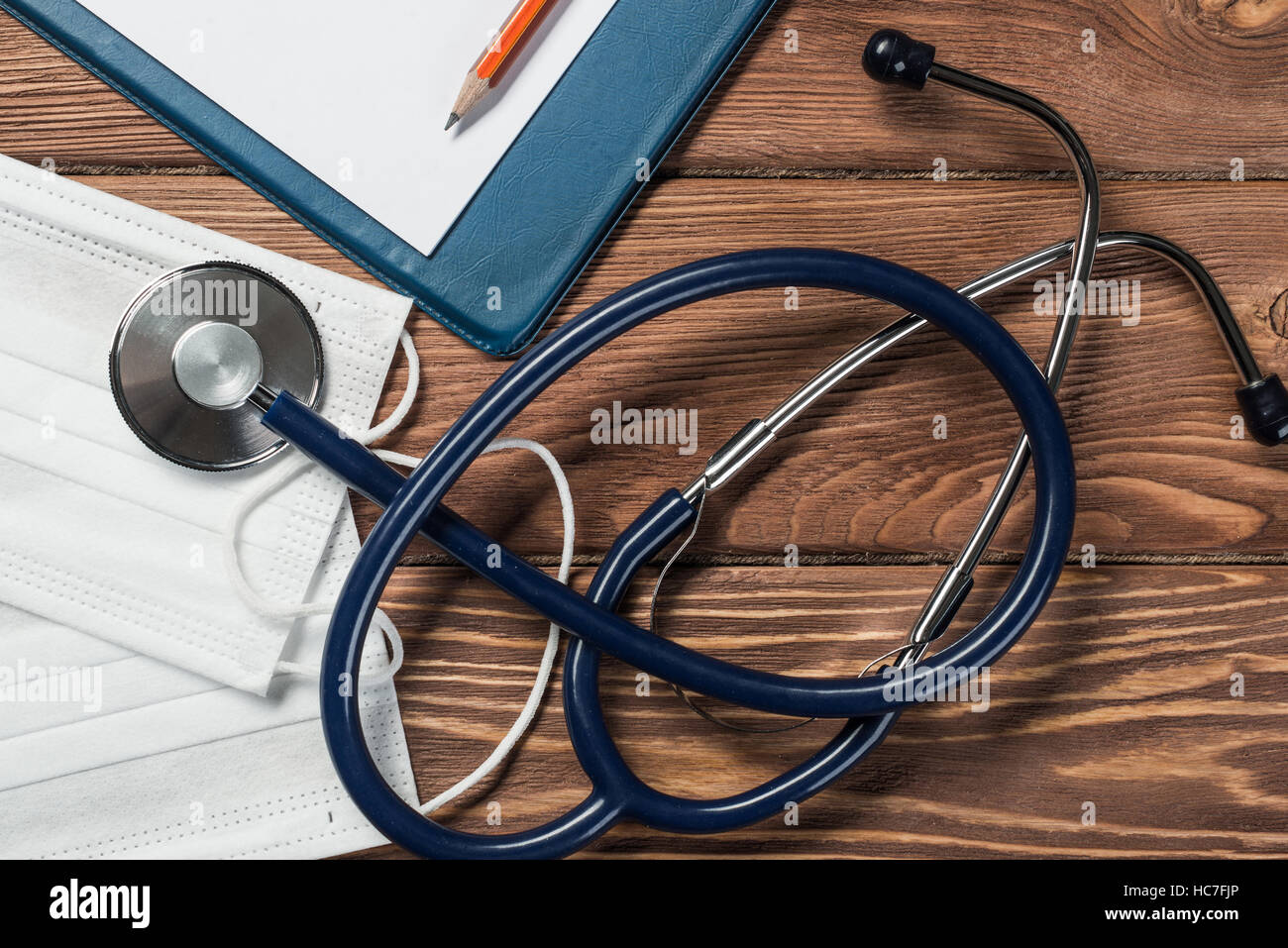 Desk of doctor with medicine things Stock Photo - Alamy