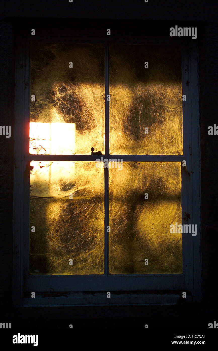 View into room through dusty, scratched window Stock Photo - Alamy