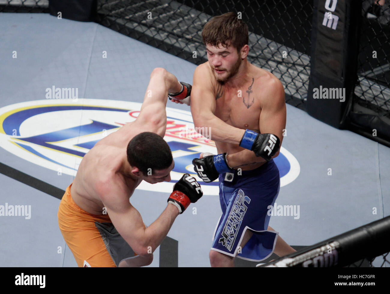 Roland Delorme, left, fights Josh Ferguson at The Ultimate Fighter 14 ...