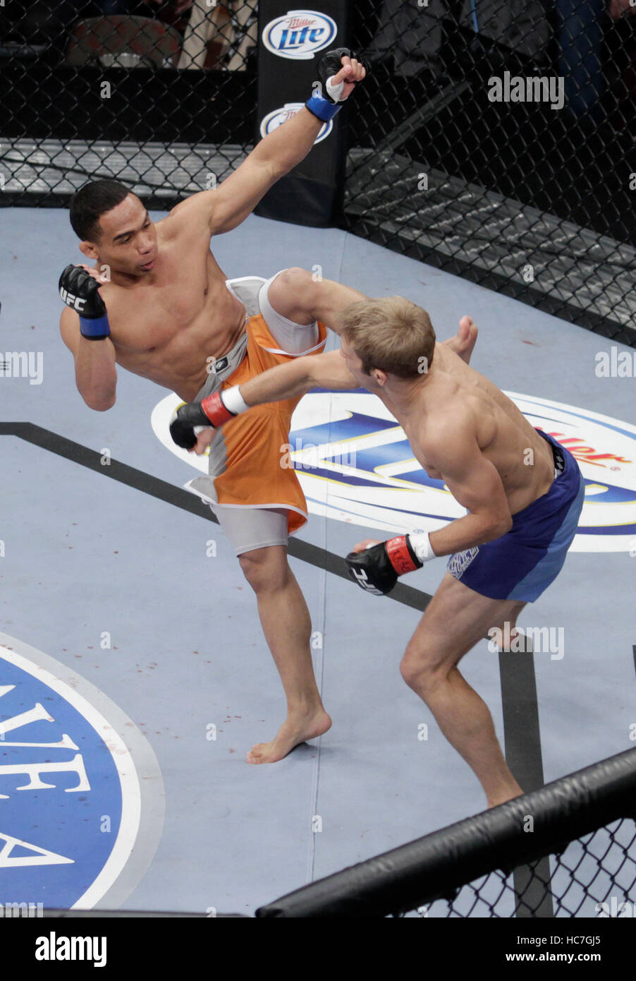John Dodson, left, fights T.J. Dillashaw at The Ultimate Fighter 14 ...