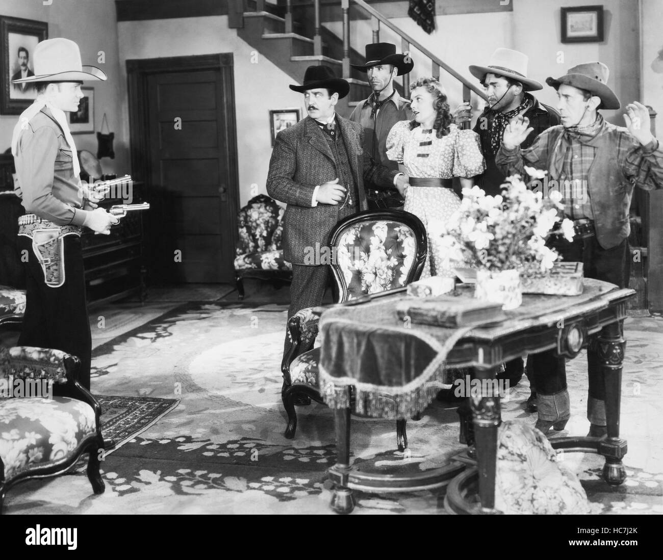 SONG OF THE BUCKAROO, from left: Tex Ritter, Charles King, Hank Worden ...