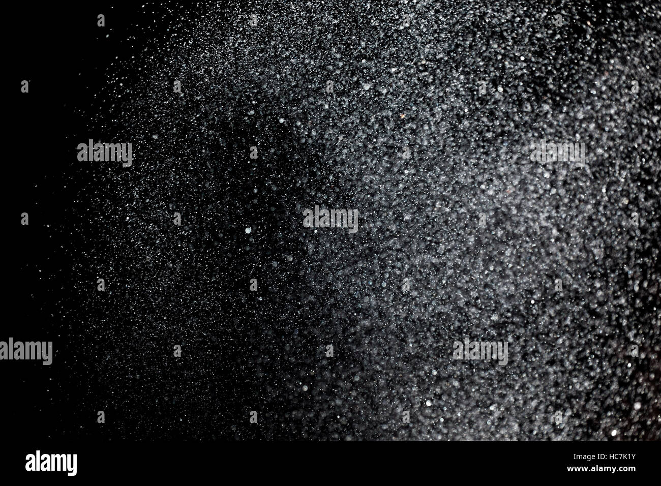 Light snowfall falling on black hi-res stock photography and images - Alamy