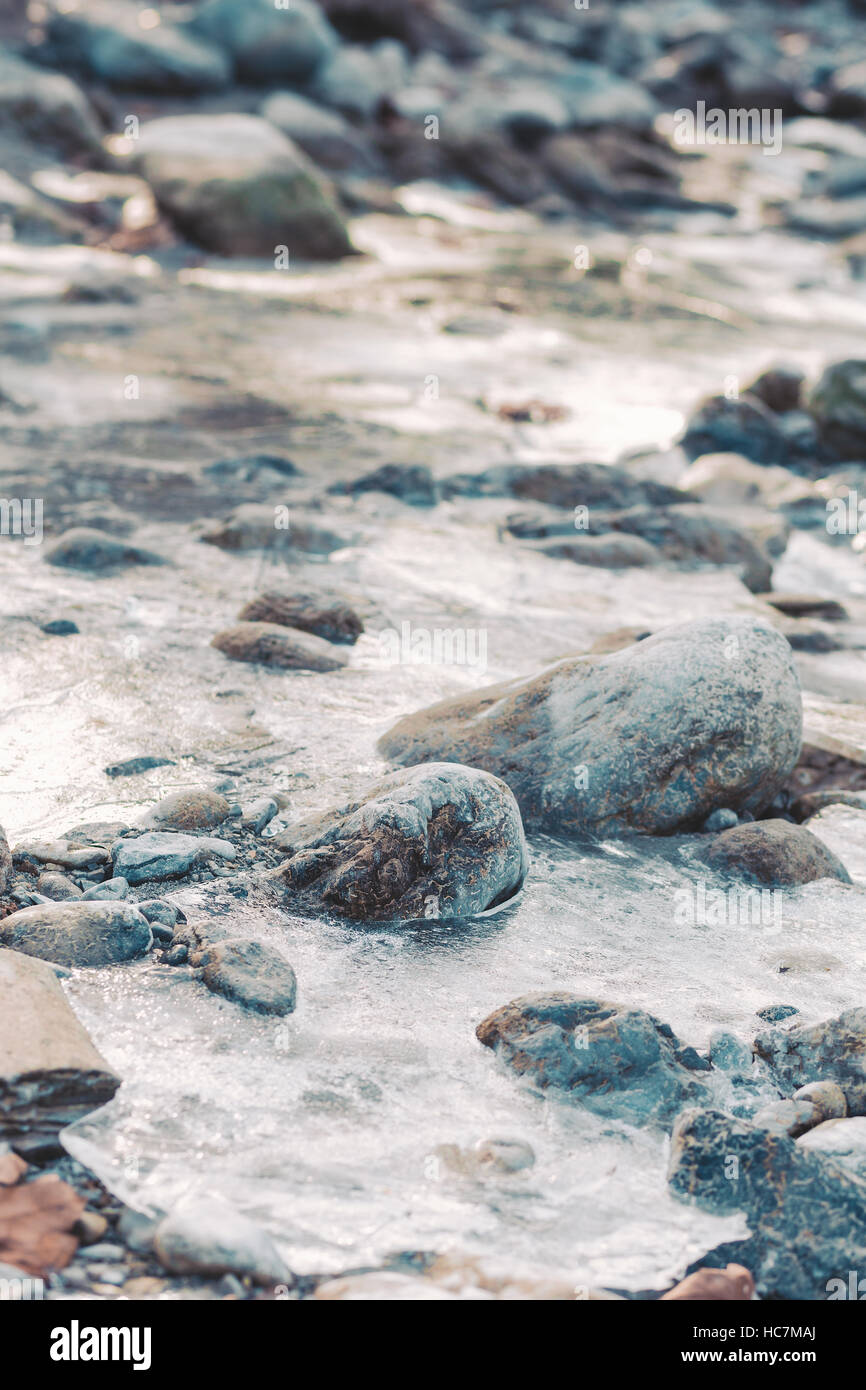 River water frozen in winter Stock Photo - Alamy
