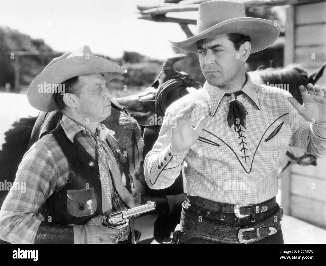 THE STRANGER FROM PECOS, from left: Raymond Hatton, Johnny Mack Brown ...