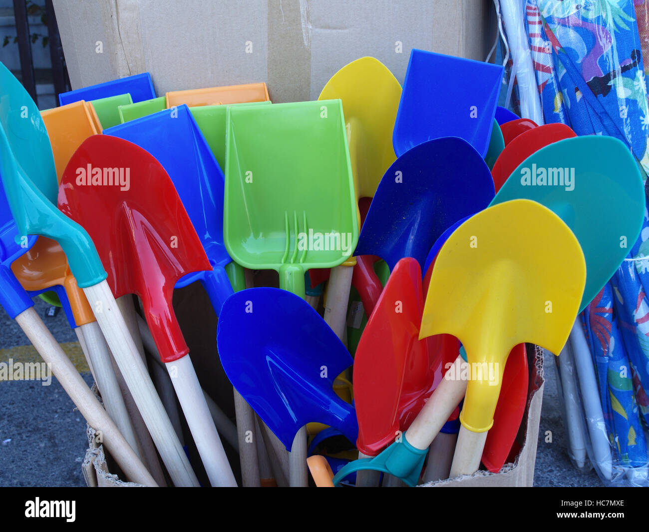 Colourful holiday plastic spades for sale at Roda Corfu Greece Stock ...