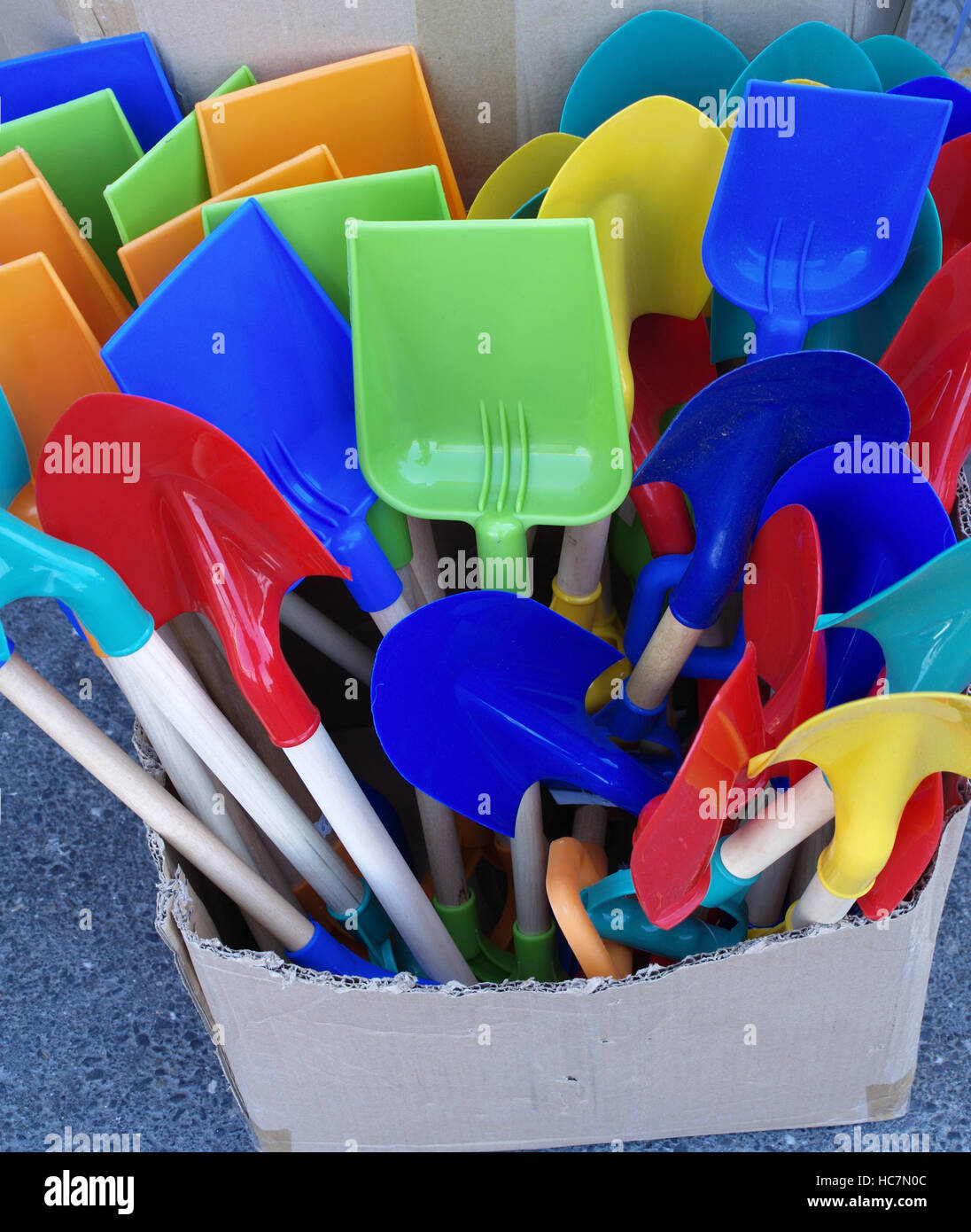 Colourful holiday plastic spades for sale at Roda Corfu Greece Stock ...