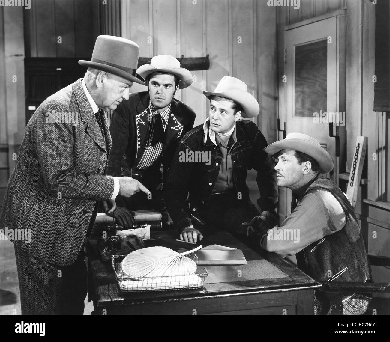 STAGECOACH KID, from left: Thurston Hall, Richard Martin, Tim Holt ...