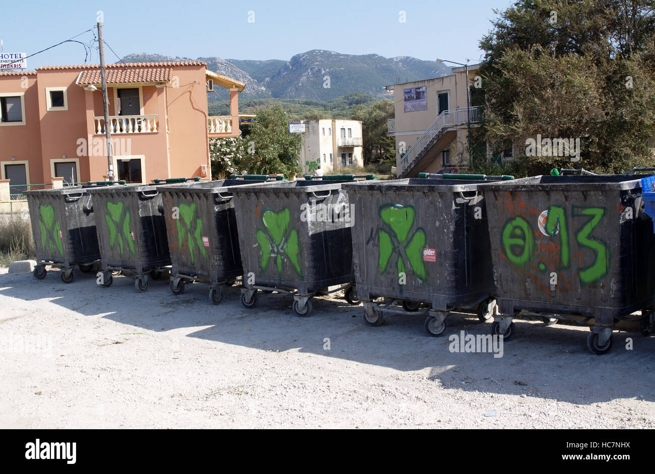 Row of empty bins in Corfu Greece as Temploni landfill refuse dump ...