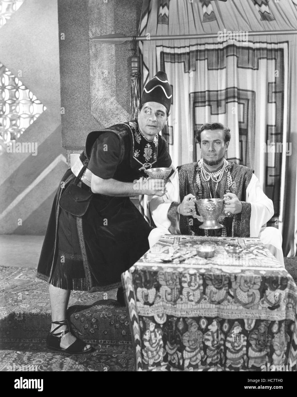 TARZAN AND THE SLAVE GIRL, from left: Anthony Caruso, Hurd Hatfield ...