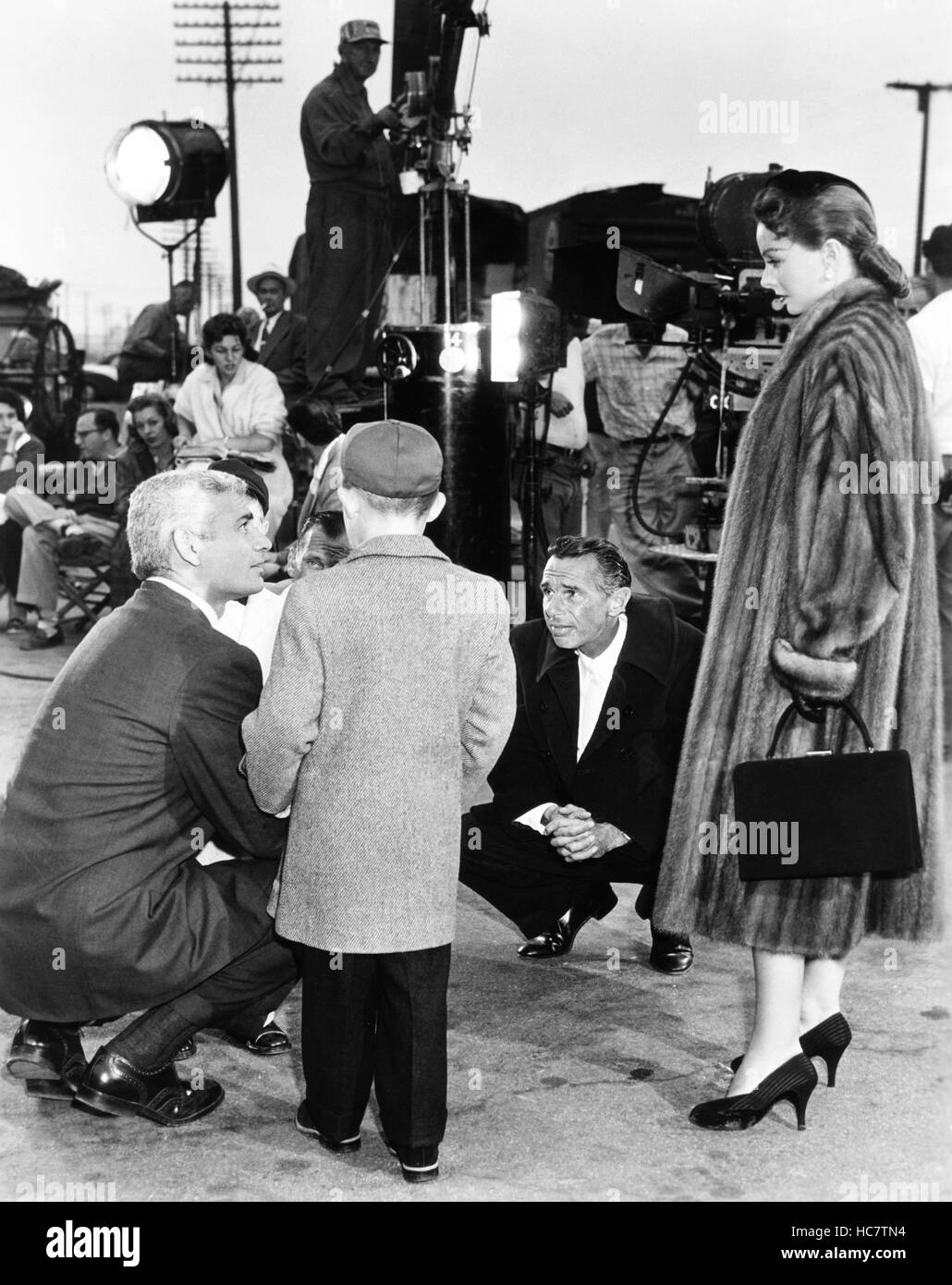 THE TATTERED DRESS, from left, Jeff Chandler, Todd Ferrell, (back to ...