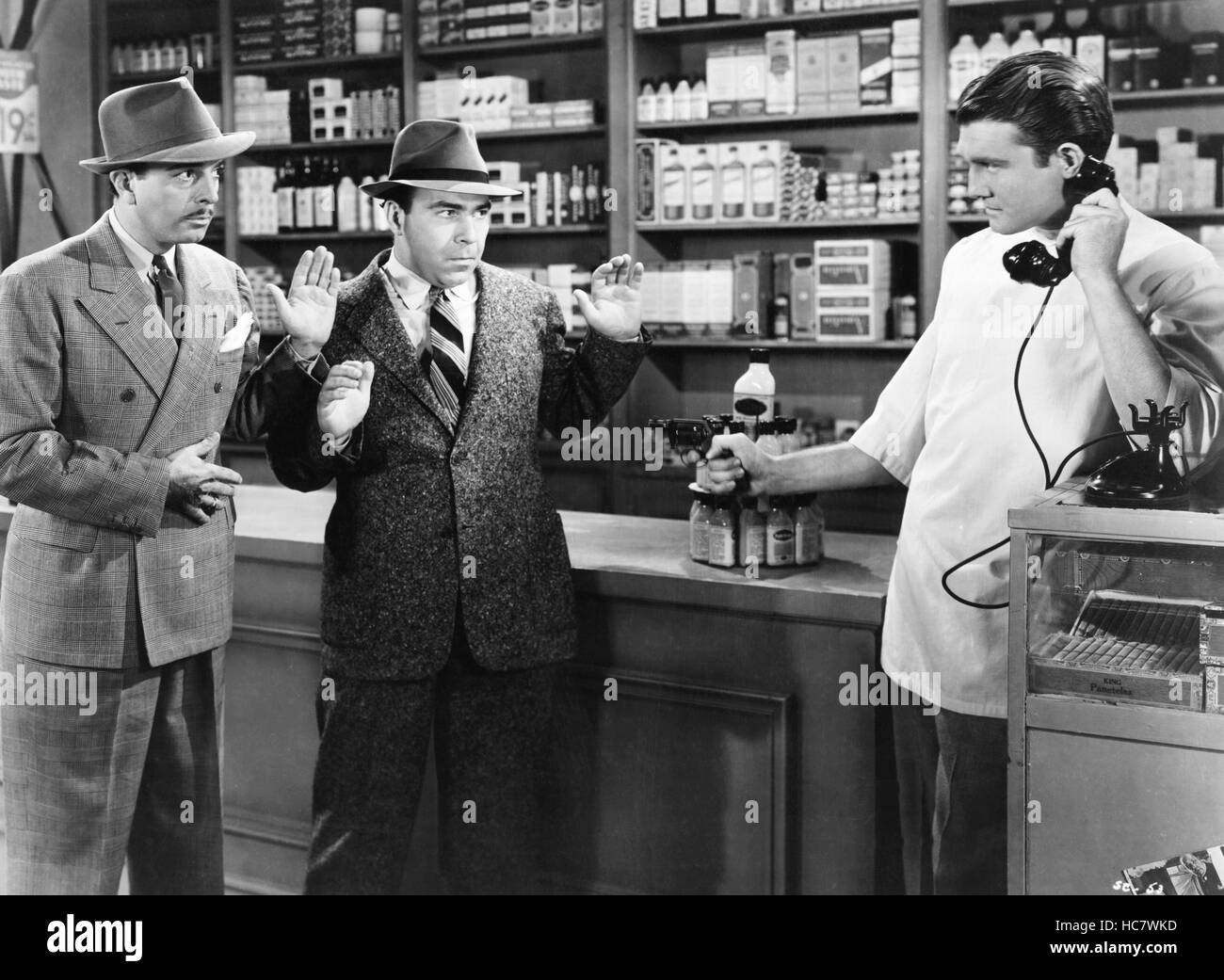 TEAR GAS SQUAD, from left: Warren Rock, Ben Welden, George Reeves, 1940 ...