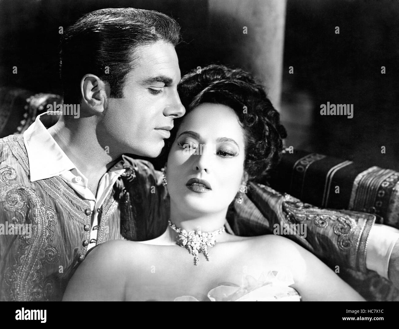 TEMPTATION, Charles Korvin, Merle Oberon, 1946 Stock Photo - Alamy