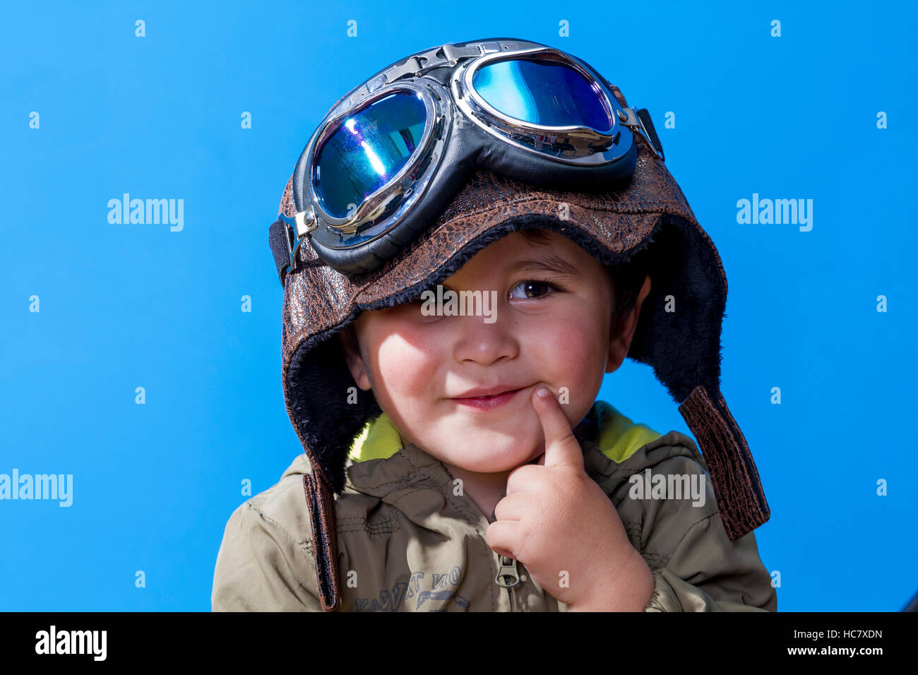 aviation, fun and funny child dressed in aviator hat and goggles Stock ...