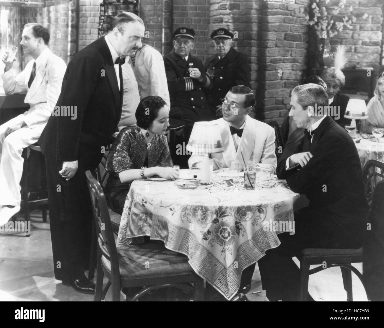 THINK FAST, MR. MOTO, from left: Sig Ruman, Lotus Long, Peter Lorre ...