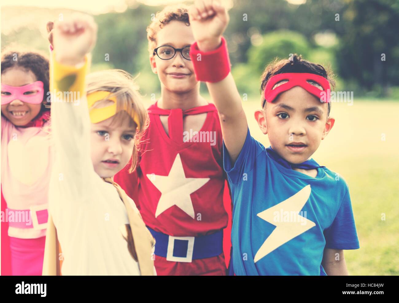 Superheroes Cheerful Kids Expressing Positivity Concept Stock Photo - Alamy