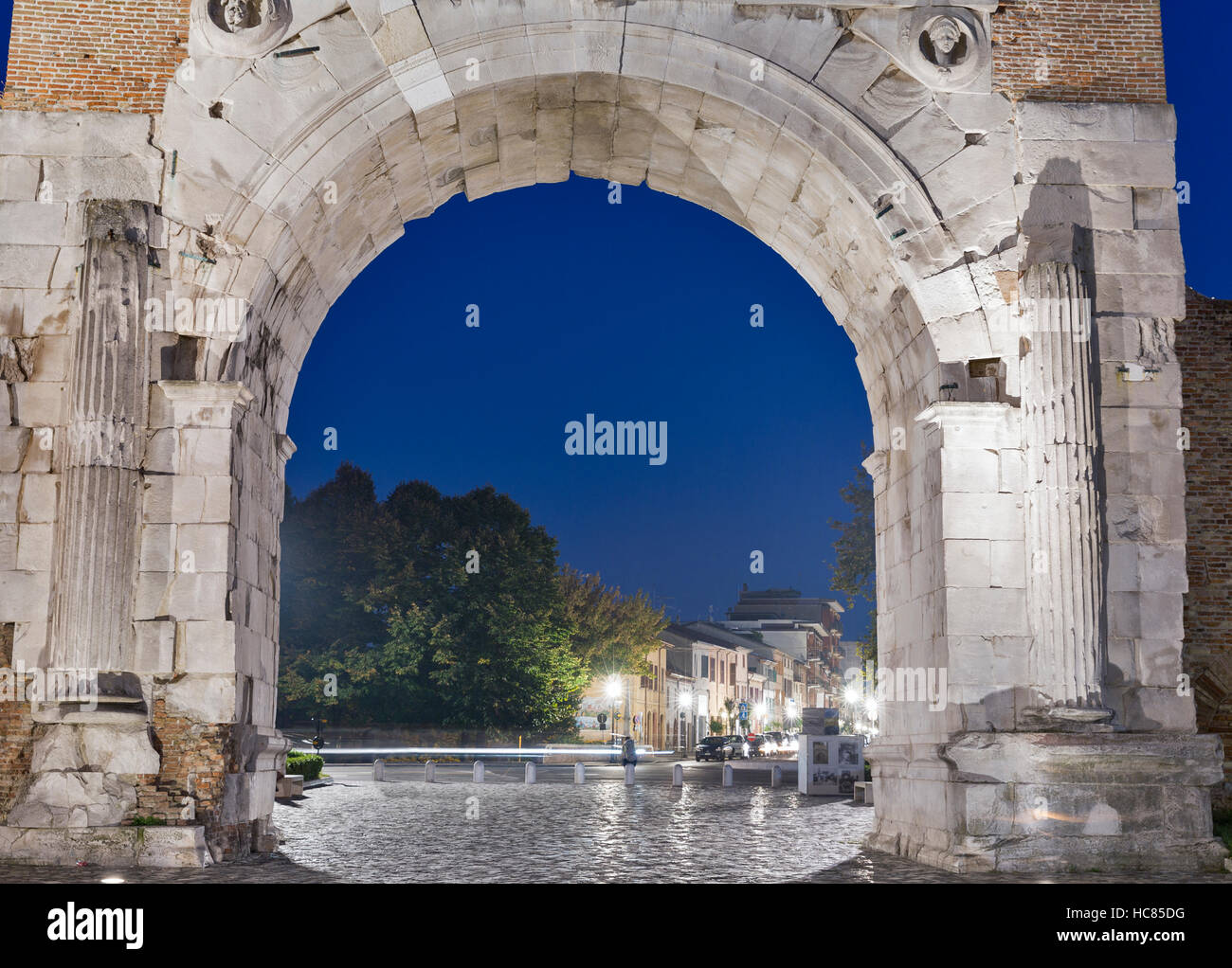 Arch of Augustus at night in Rimini, Italy. Ancient romanesque gate of ...