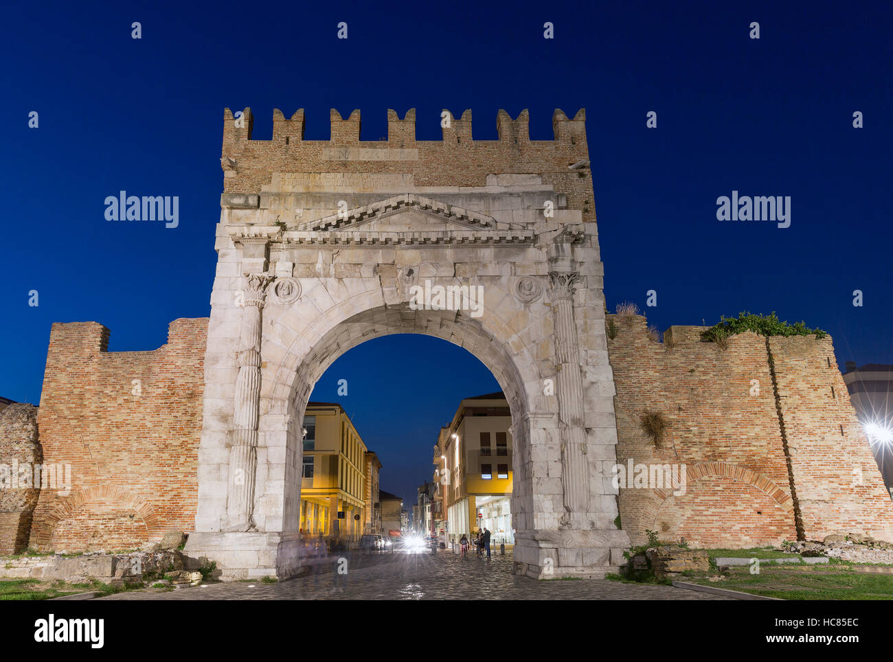 Arch of Augustus at night in Rimini, Italy. Ancient romanesque gate of ...