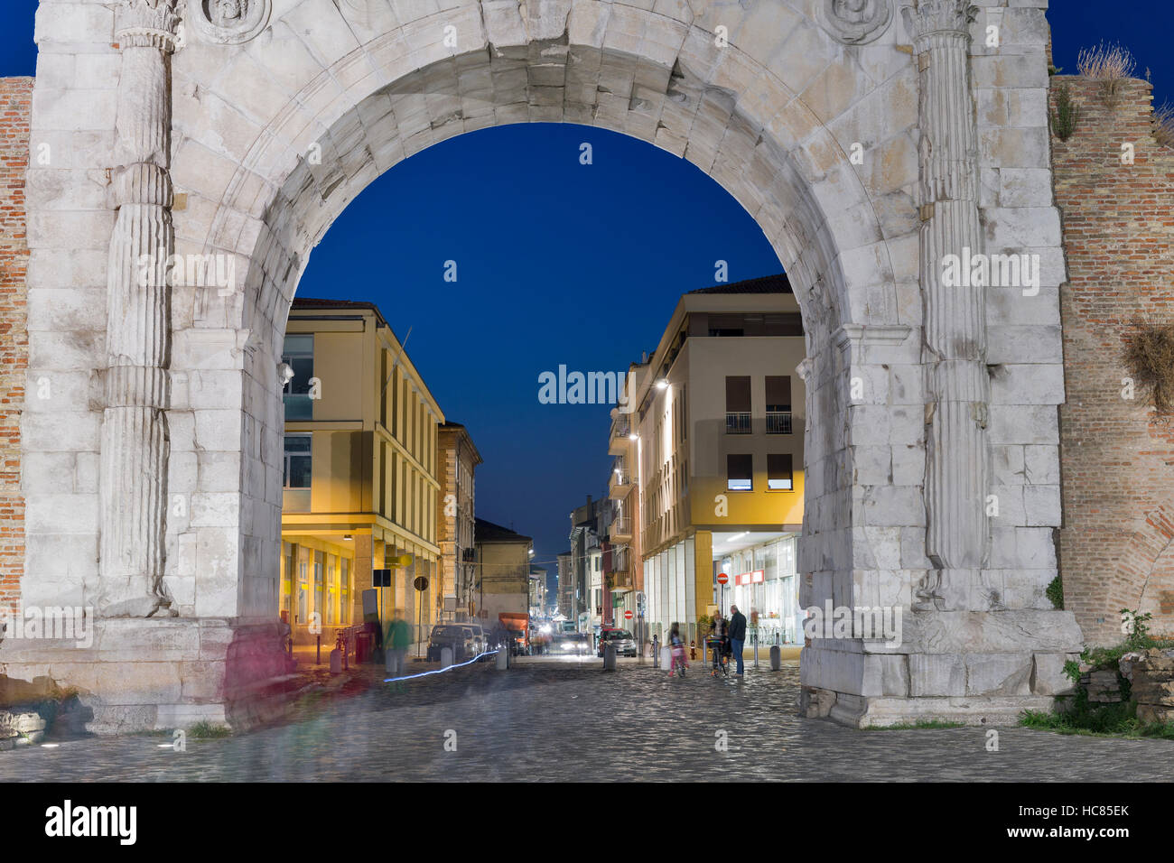 Arch of Augustus and night Corso d'Augusto Street in Rimini, Italy ...