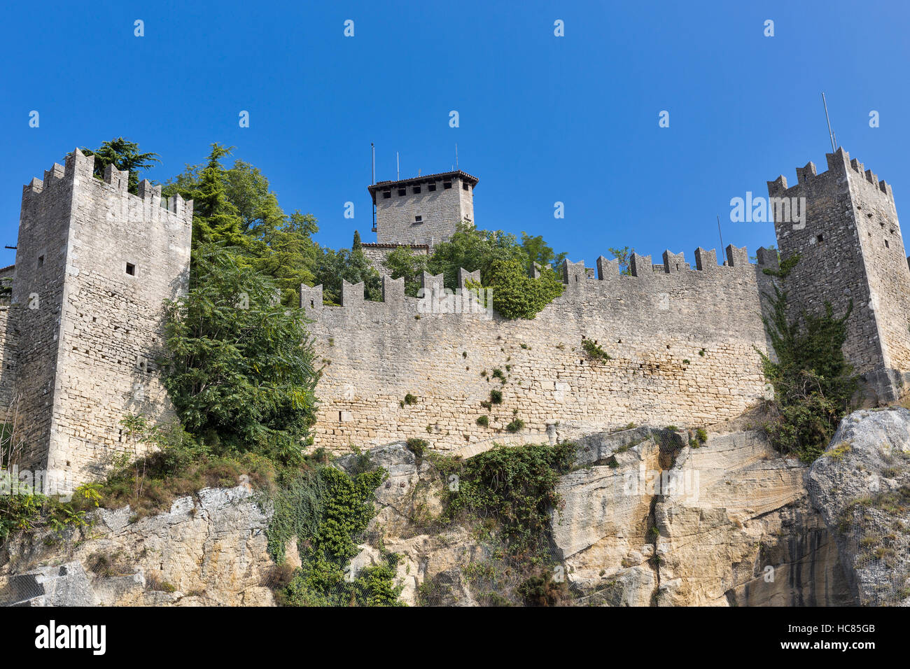 The walls of Guaita fortress, the oldest and the most famous tower on ...