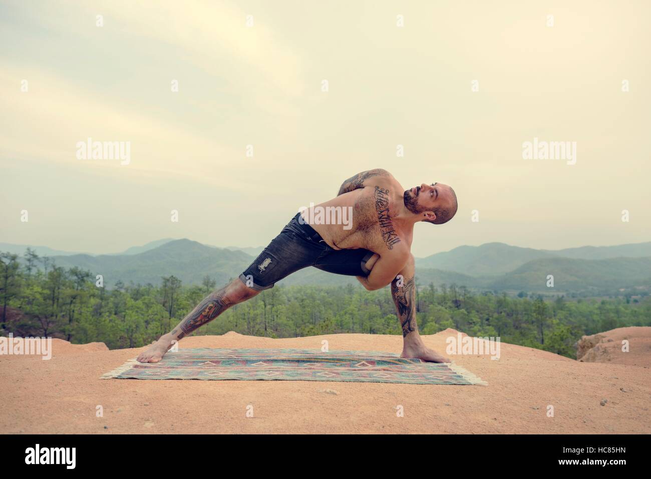 Man Doing Yoga Exercise Concept Stock Photo - Alamy