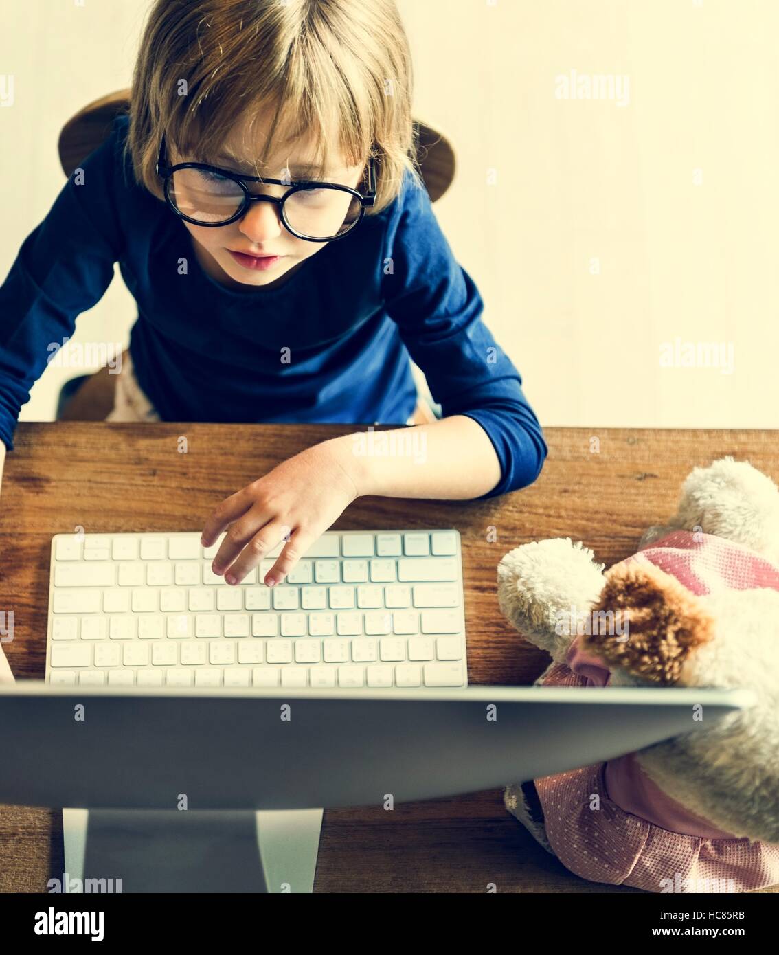 Little Girl Using Computer Concept Stock Photo - Alamy