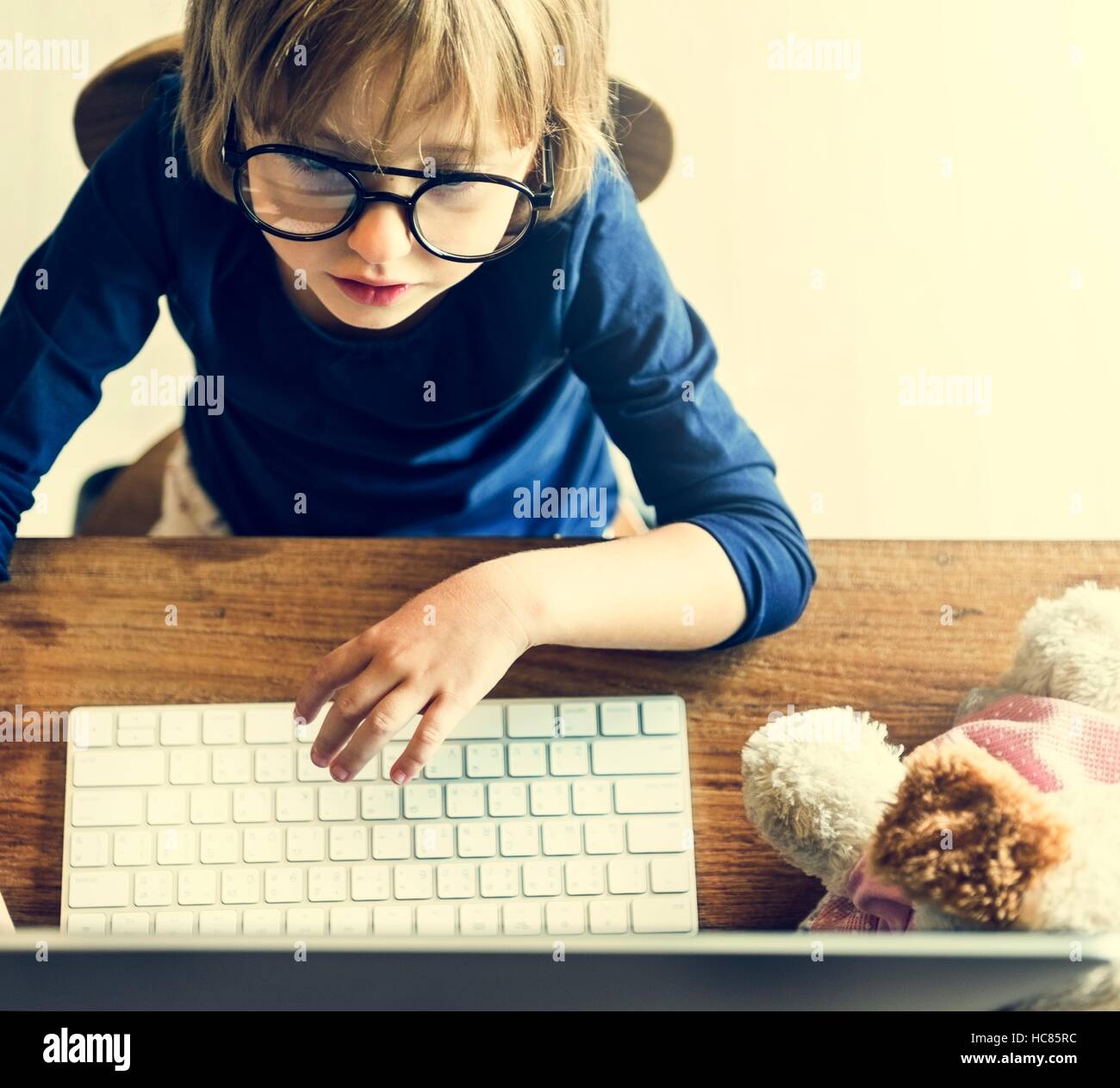 Little Girl Using Computer Concept Stock Photo - Alamy