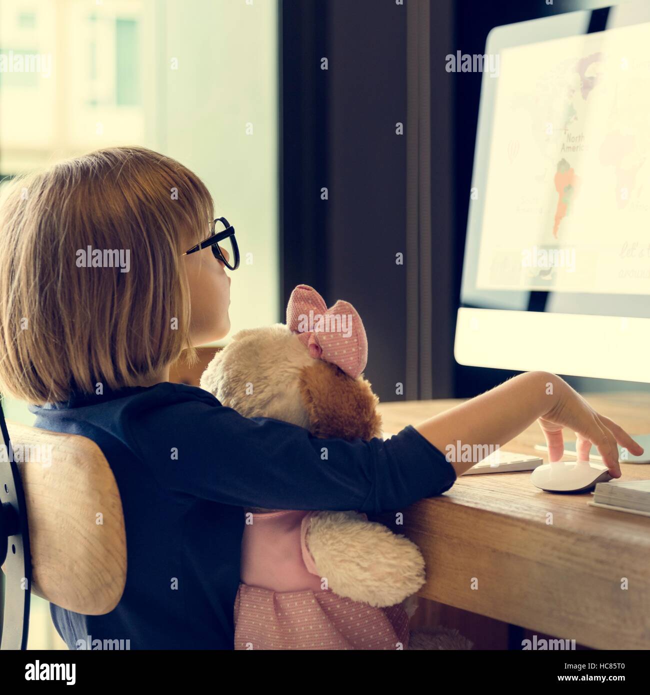 Little Girl Using Computer Concept Stock Photo - Alamy