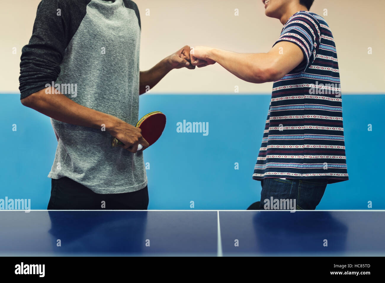 Diverse friends playing tennis hi-res stock photography and images - Alamy
