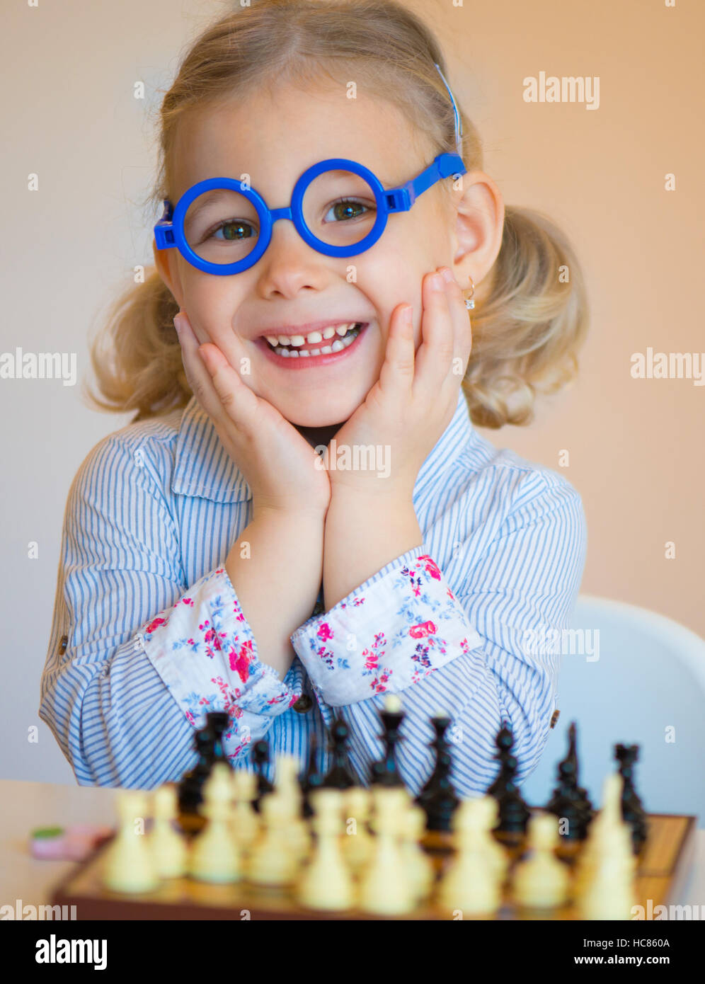 Beautiful girl playing chess hi-res stock photography and images - Alamy