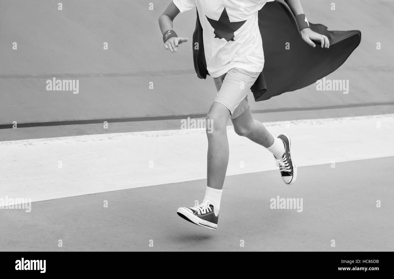 Superhero Boy Brave Running Activity Concept Stock Photo - Alamy