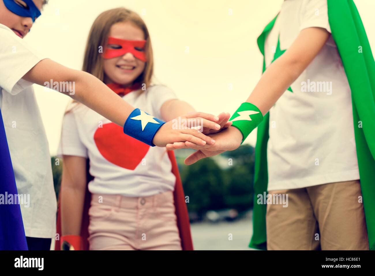 Superhero Boy Girl Brave Imagination Teamwork Concept Stock Photo - Alamy
